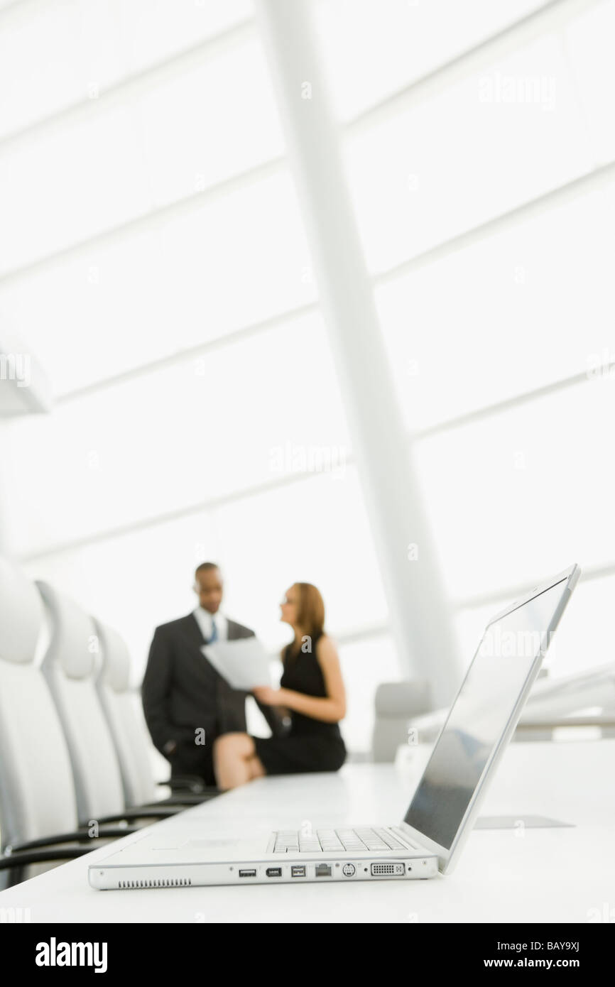 African business people and laptop in conference room Stock Photo - Alamy