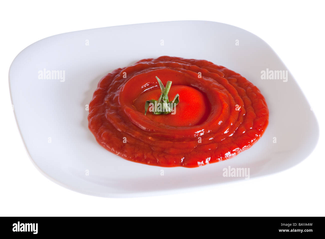 Tomato being smashed into ketchup Stock Photo - Alamy