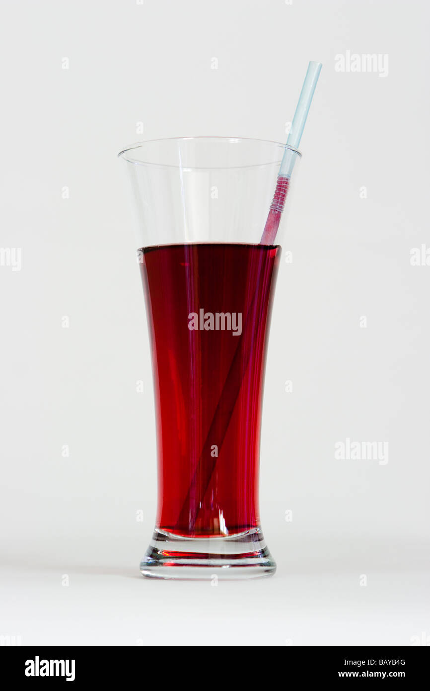 Drinking glass with straw Stock Photo - Alamy