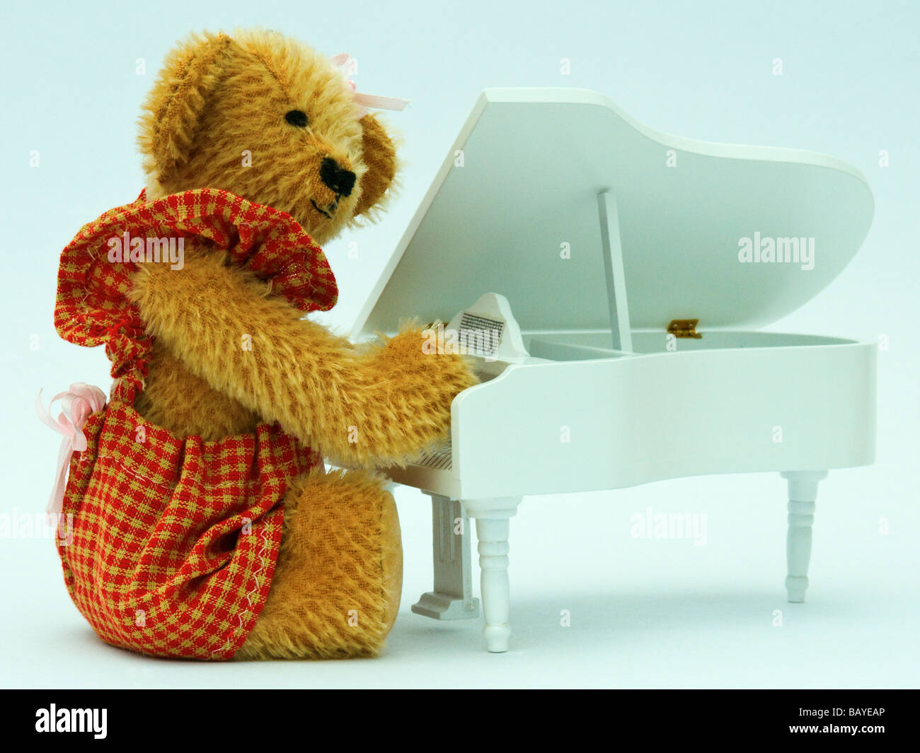 Mini teddy bear with the grand piano (Mini Bear Collection Stock Photo ...