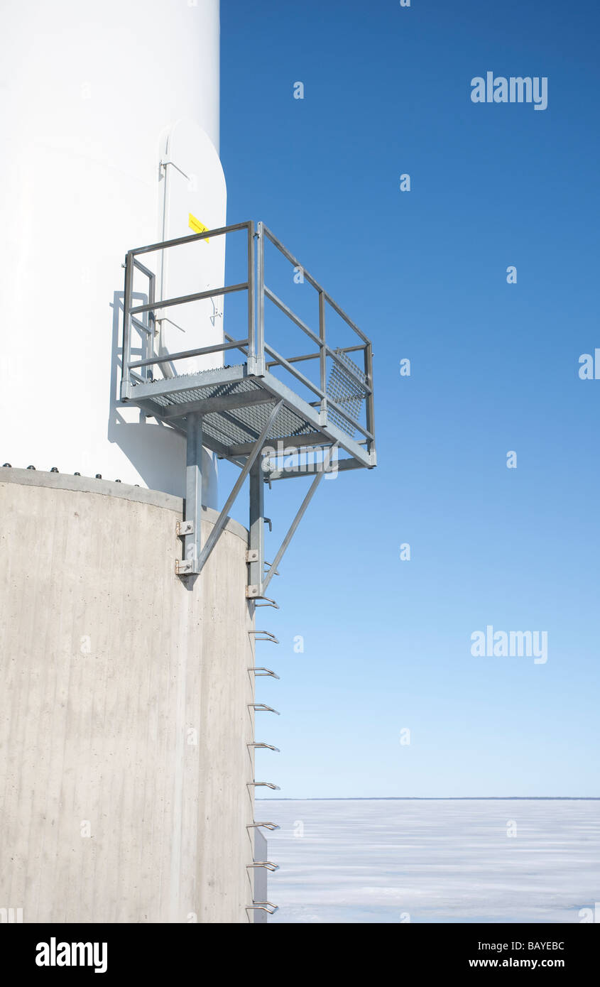Metallic platform and door at wind power plant pylon foundation ...