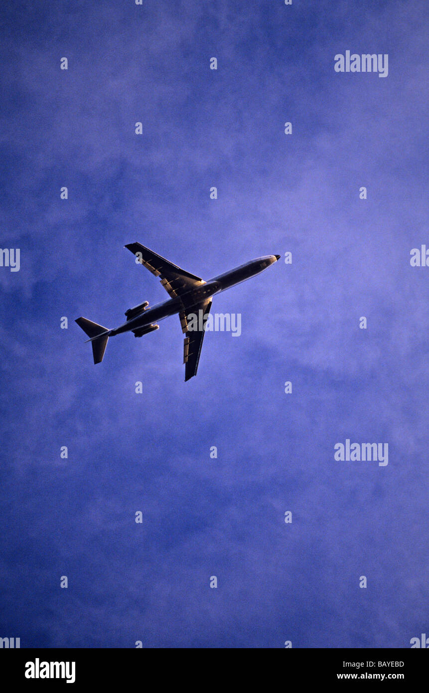 Airplane flying in sky Washington State USA Stock Photo - Alamy