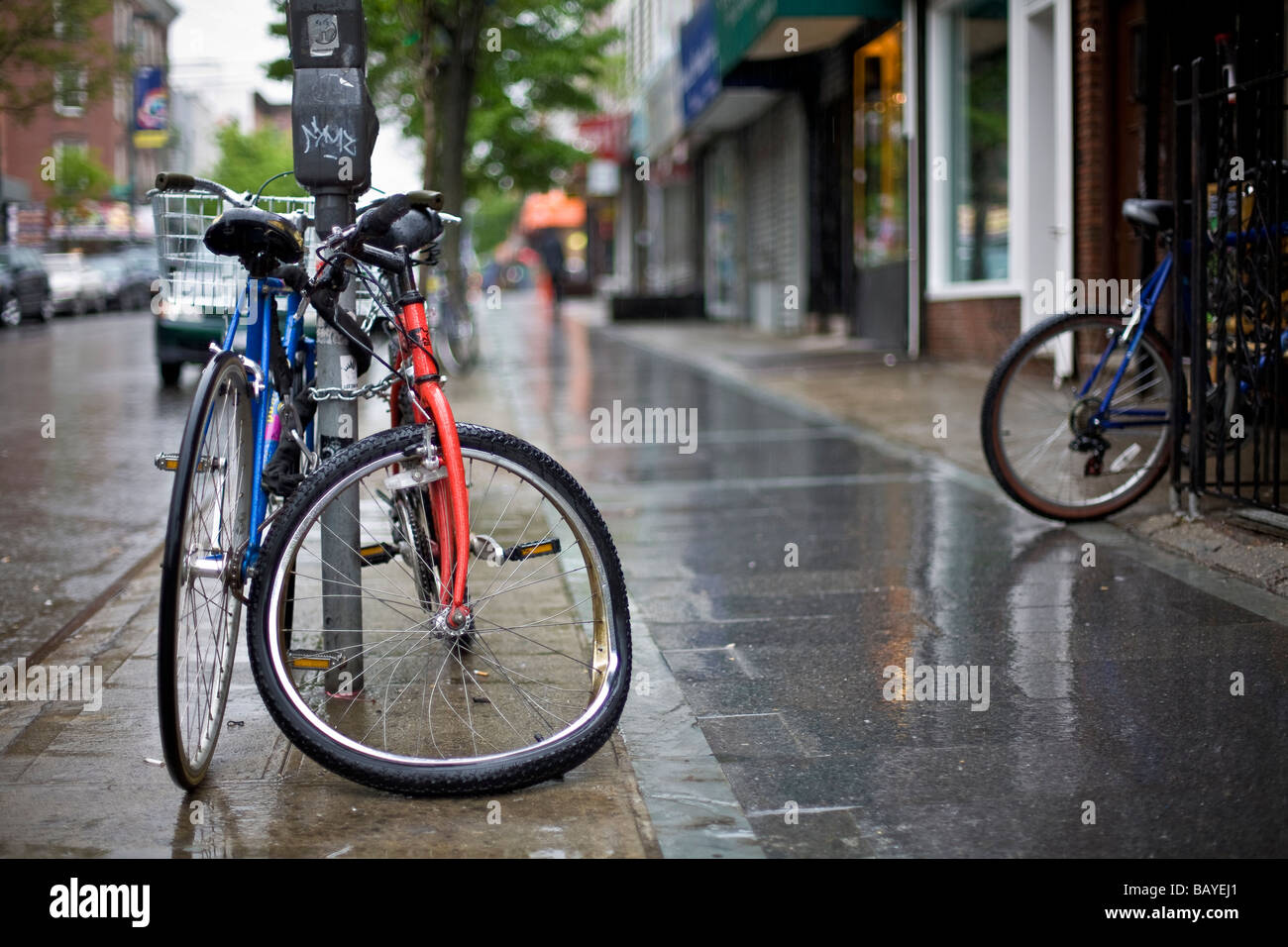 Bicycle with tilted wheel chained to a poll Stock Photo - Alamy Bicycle with tilted wheel chained to a poll Stock Photo - Alamy