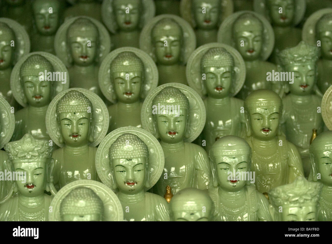 Jade Buddha statues are displayed at Bohyeon Temple in Cheongdo, North ...