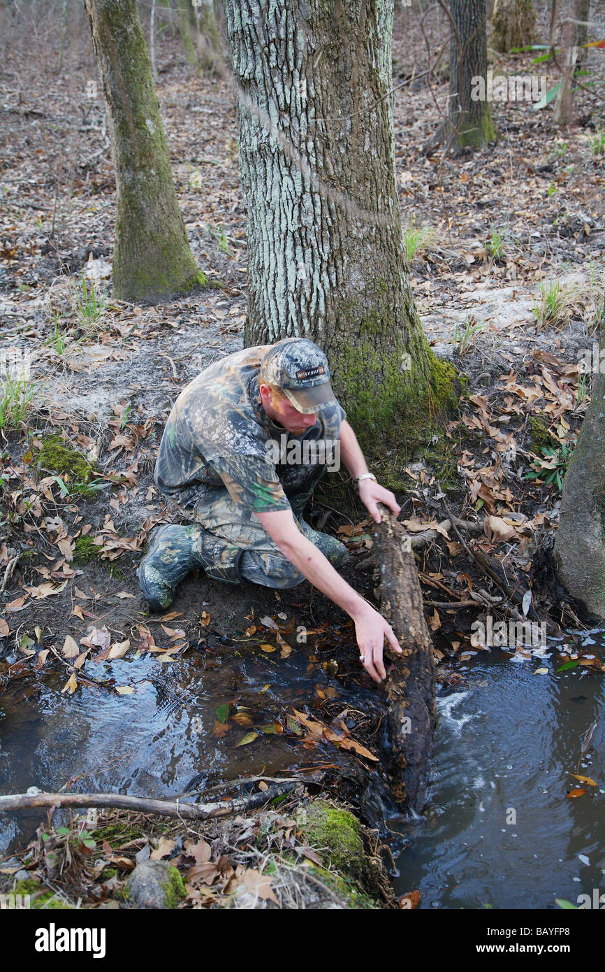 HUNTER ADJUSTING WATER FLOW TO QUIET DOWN CREEK IMPROVING ABILITY TO ...