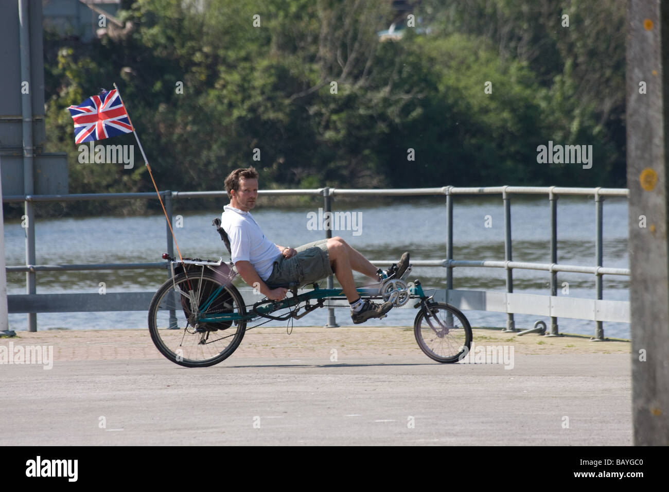 disabled male cyclist low riider flag cycle river medway allington lock ...