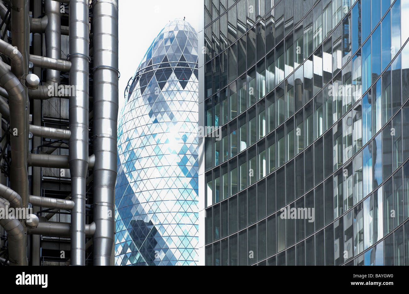 The Gherkin viewed between two buildings in London Stock Photo - Alamy