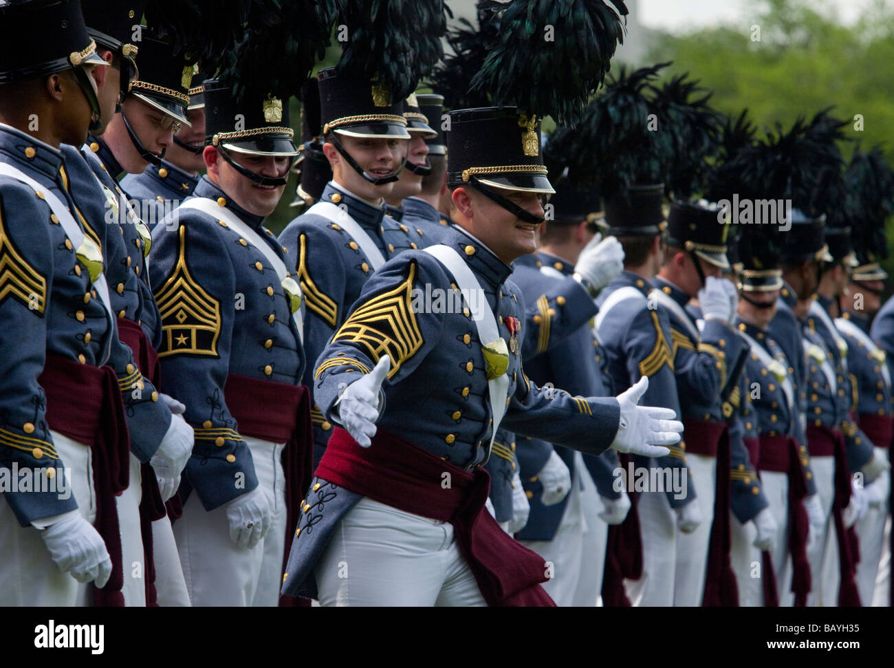 A graduating cadet mugs for family during the Long Grey Line graduation ...