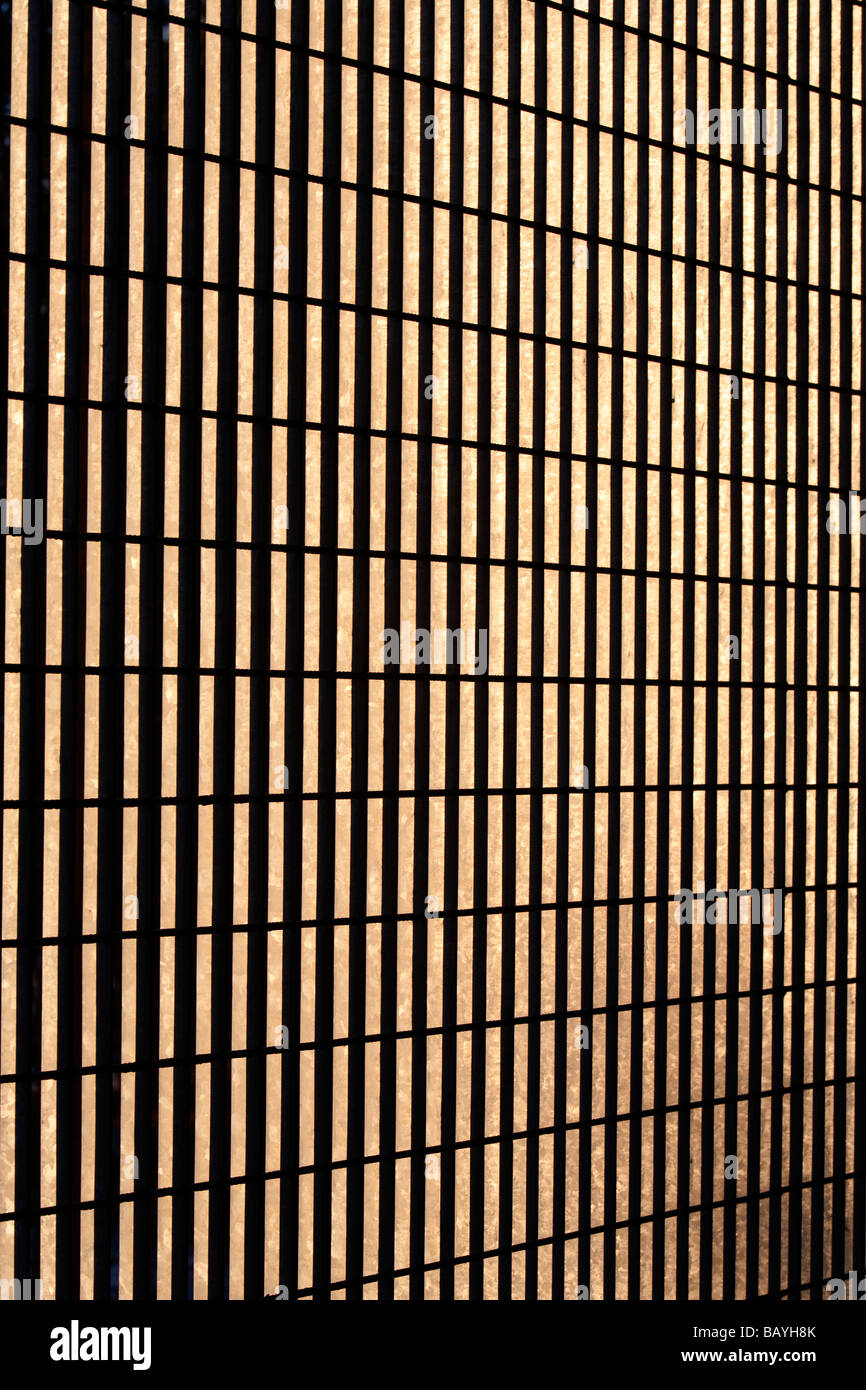 Metal mesh protecting window Stock Photo - Alamy