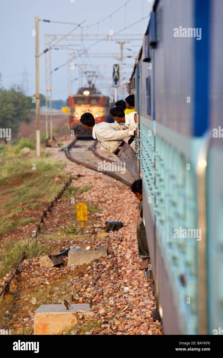 Indian Men Looking from a Train in Uttar Pradesh India Stock Photo - Alamy