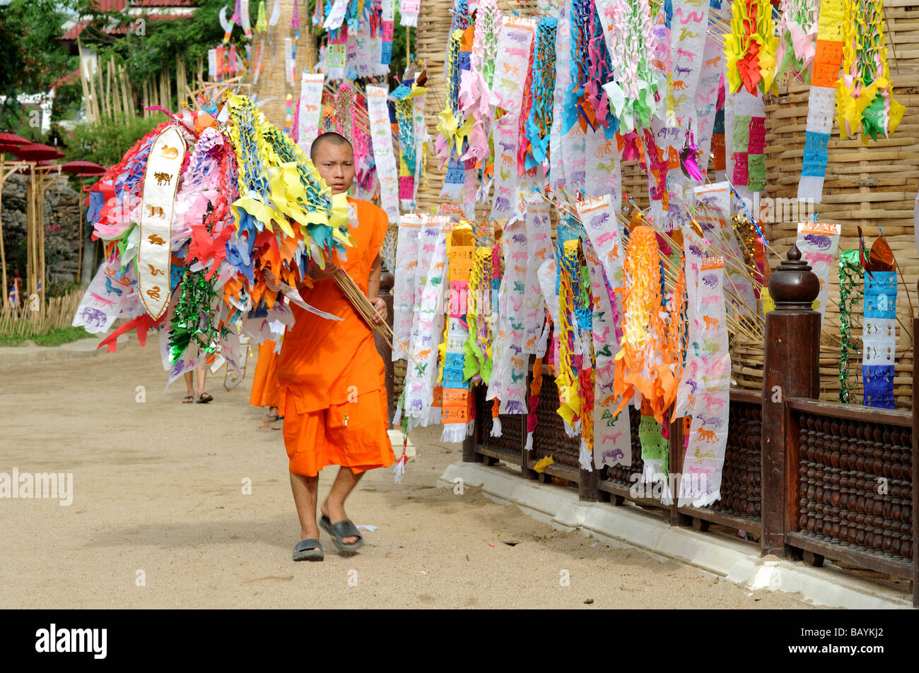 monks with songkran decorations at wat phan tao chiangmai thailand ...