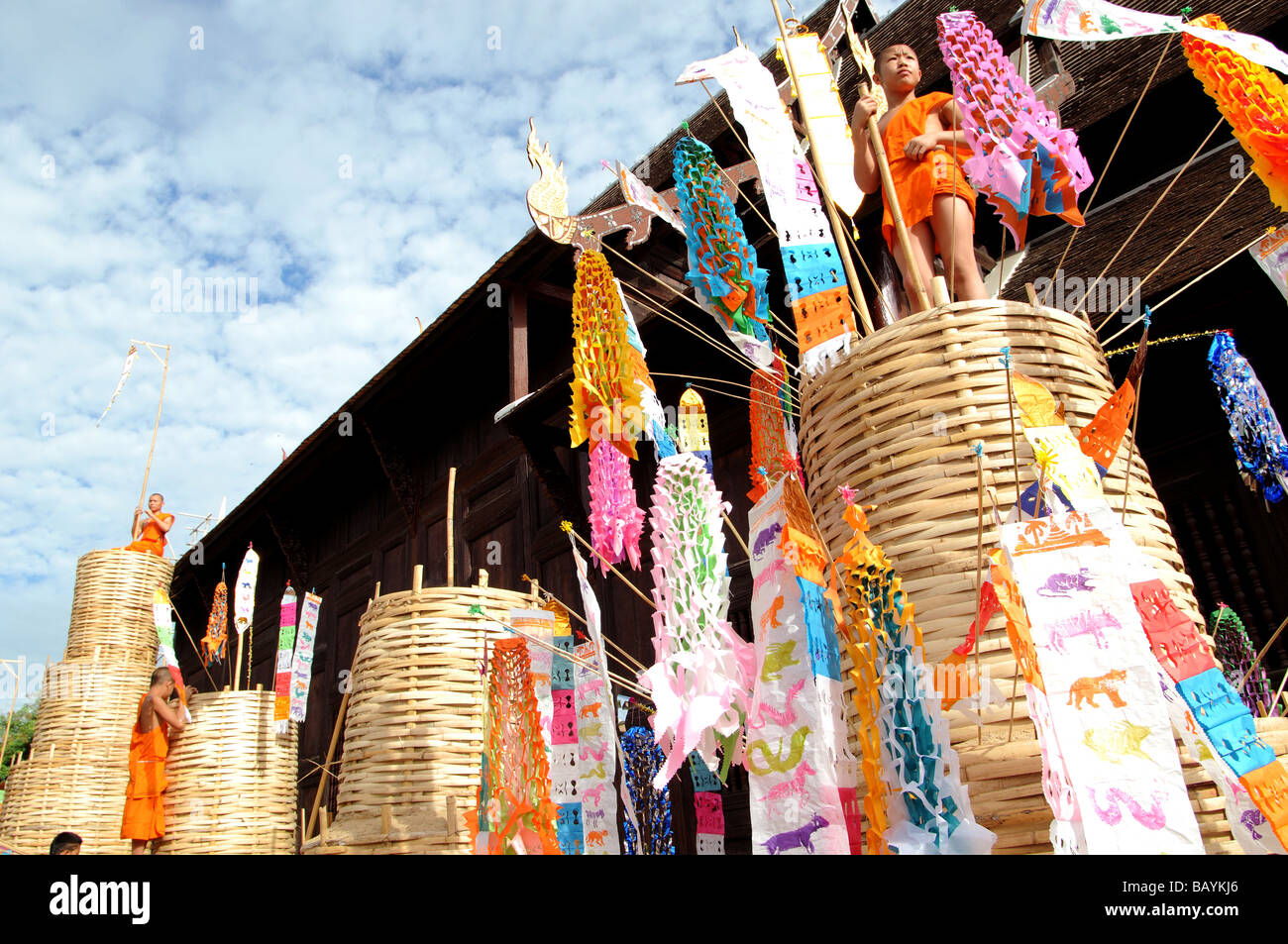 monks with songkran decorations at wat phan tao chiangmai thailand ...