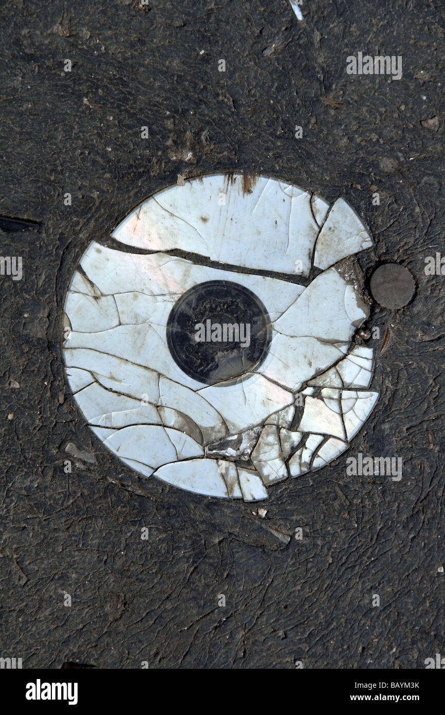 one old damaged cd compcat disc on road surface Stock Photo - Alamy
