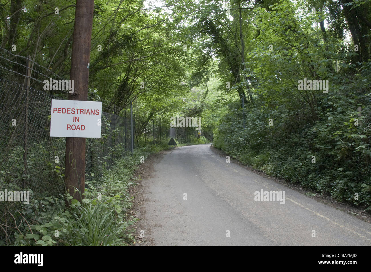 A warning sign on a country road Stock Photo - Alamy