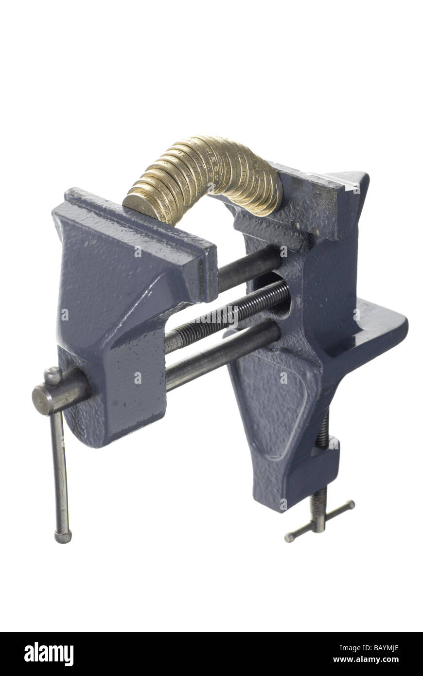 UK one pound coins being squeezed in a vice Stock Photo - Alamy