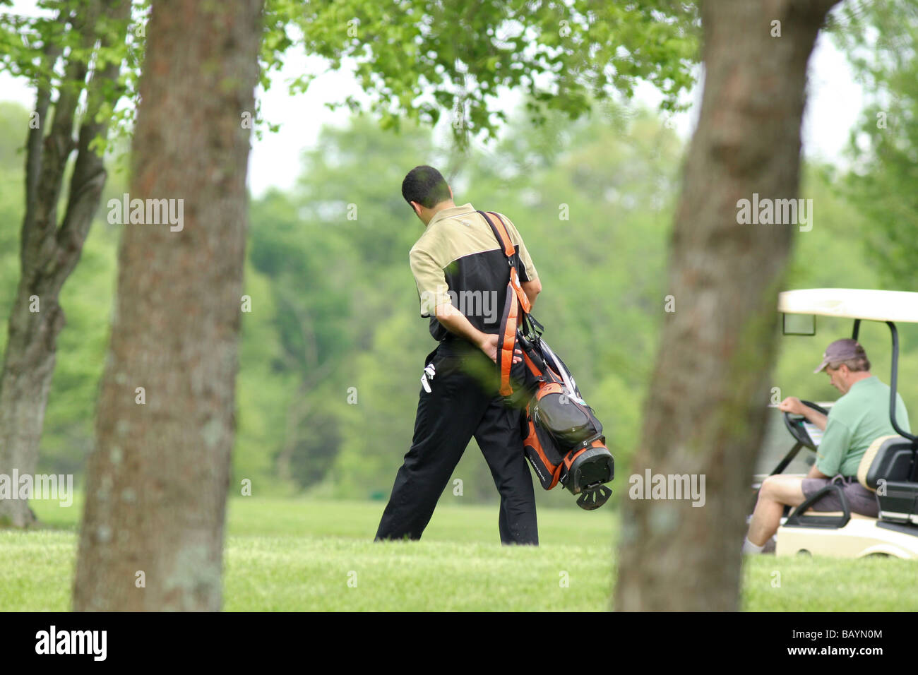 Playing golf on a public golf course Stock Photo - Alamy