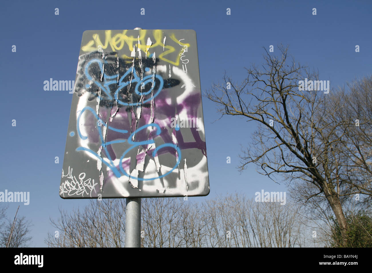 public information sign covered with graffiti in countryside Stock ...