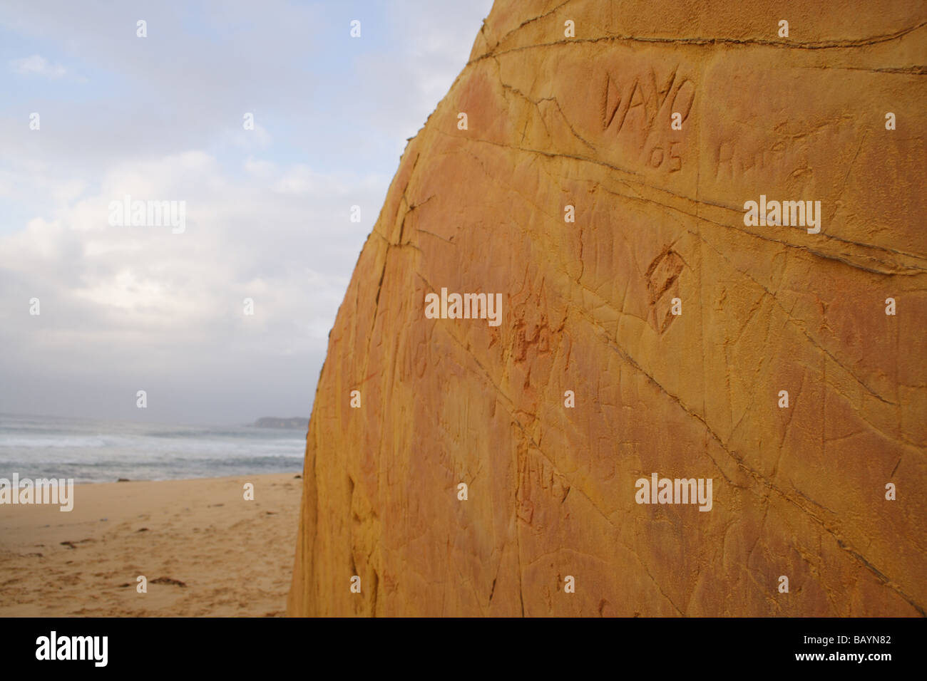 Graffiti on rock beach hi-res stock photography and images - Alamy
