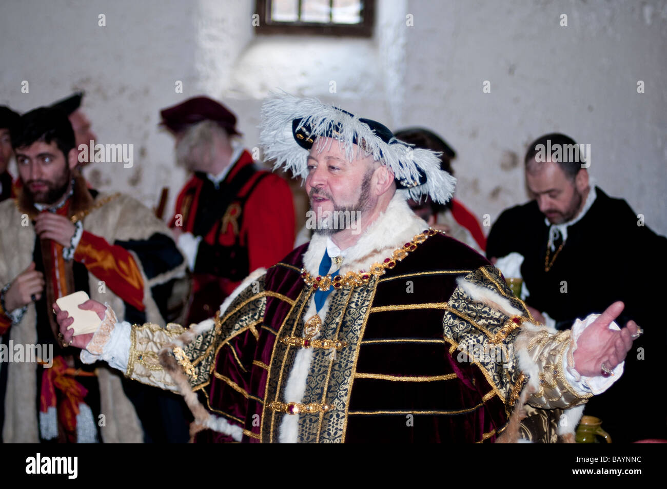 An actor performs as Henry VIII in the wine cellars of Hampton Court ...
