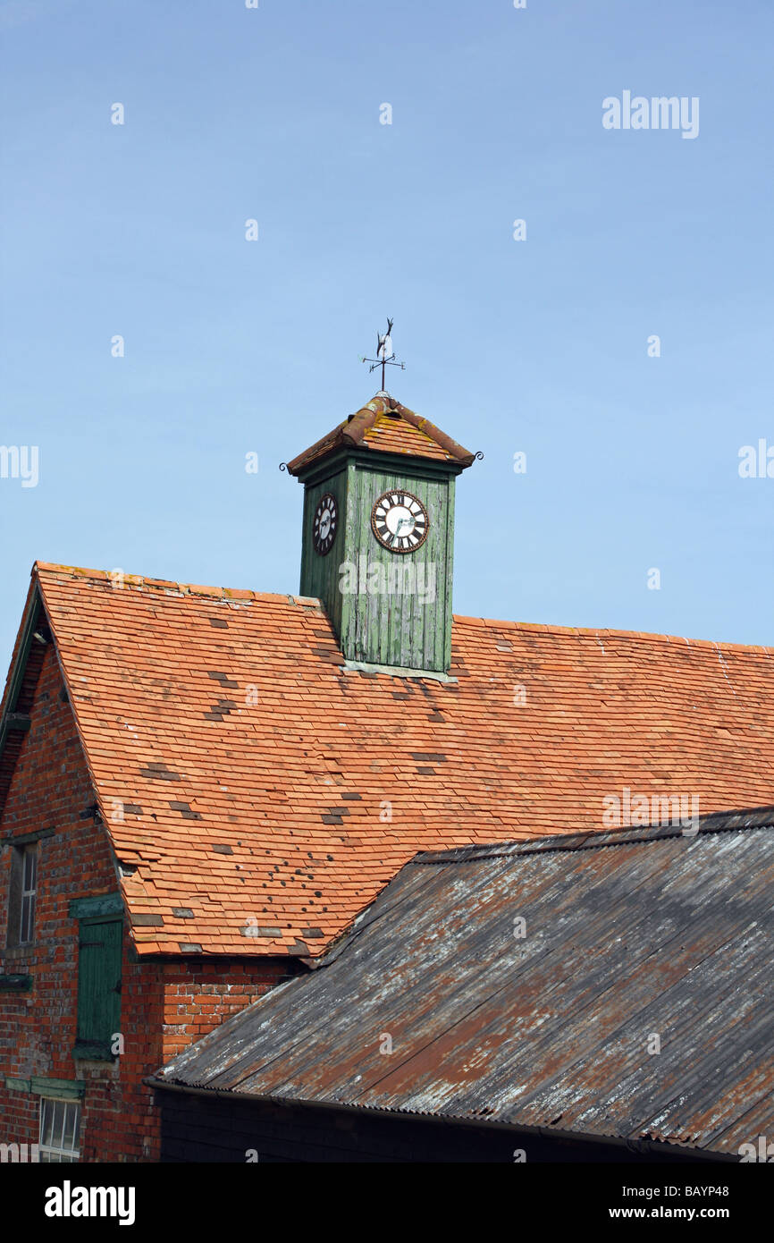 An old clock on ancient barn Stock Photo - Alamy