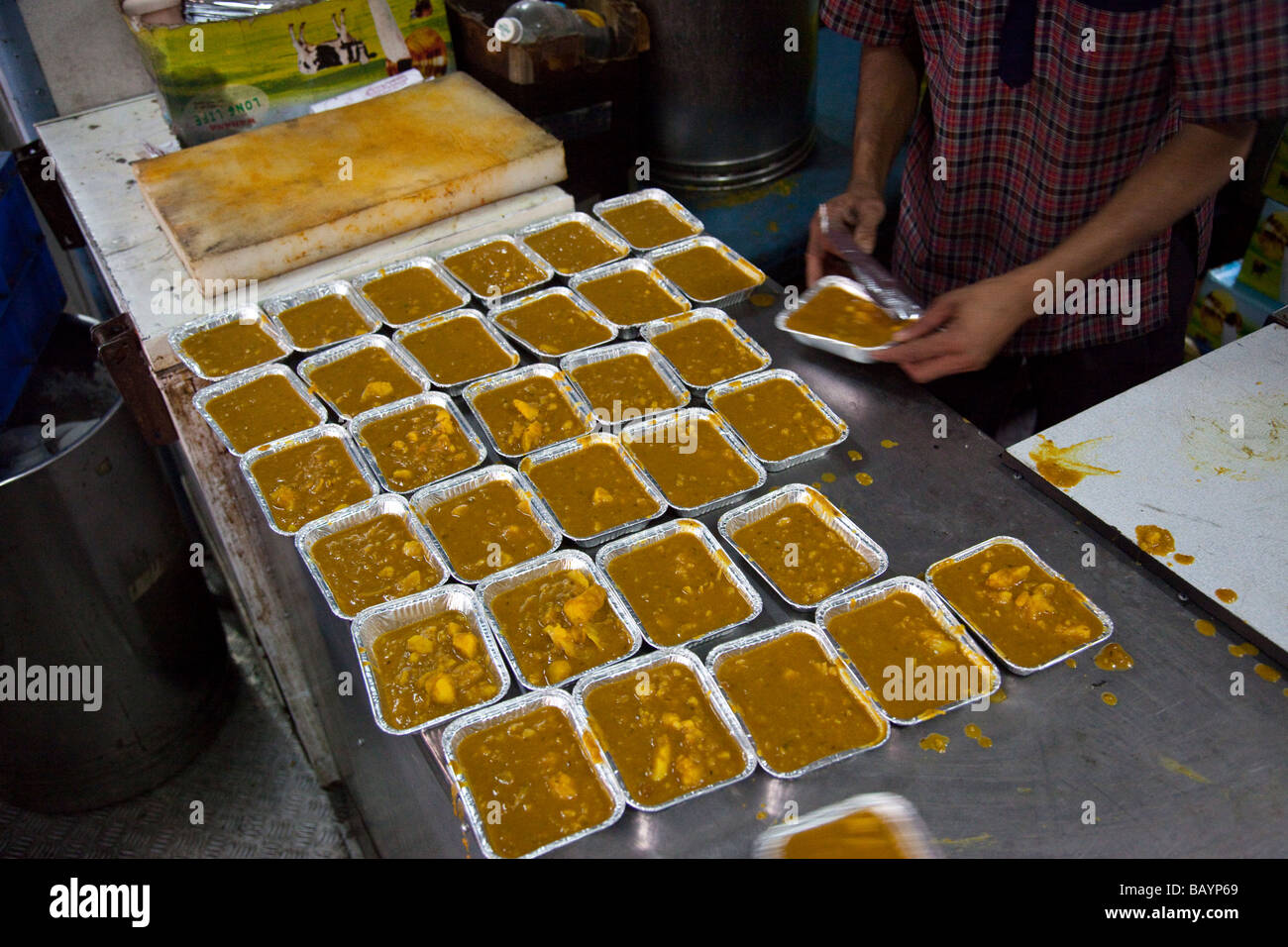 Packing Train Meals in the Food Car on a Train in India Stock Photo - Alamy