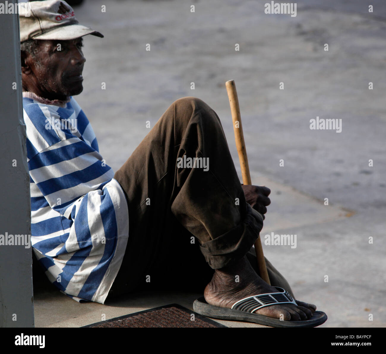 old man in Barbados resting from sun Stock Photo - Alamy