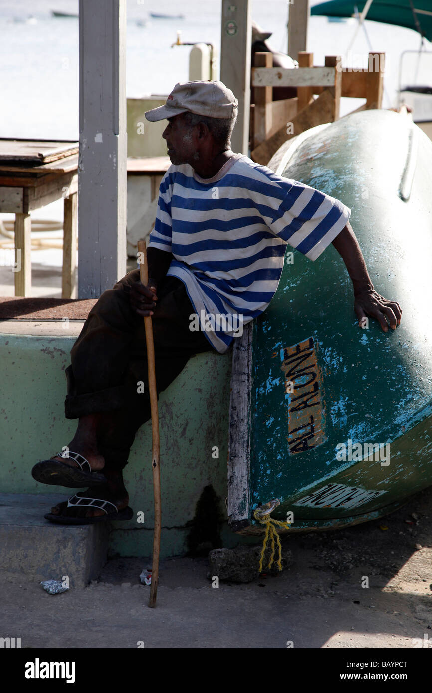 old man in Barbados resting from sun Stock Photo - Alamy