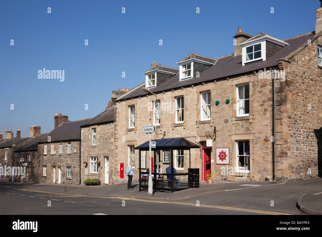 Corbridge Northumberland England UK Europe People waiting in a bus stop ...