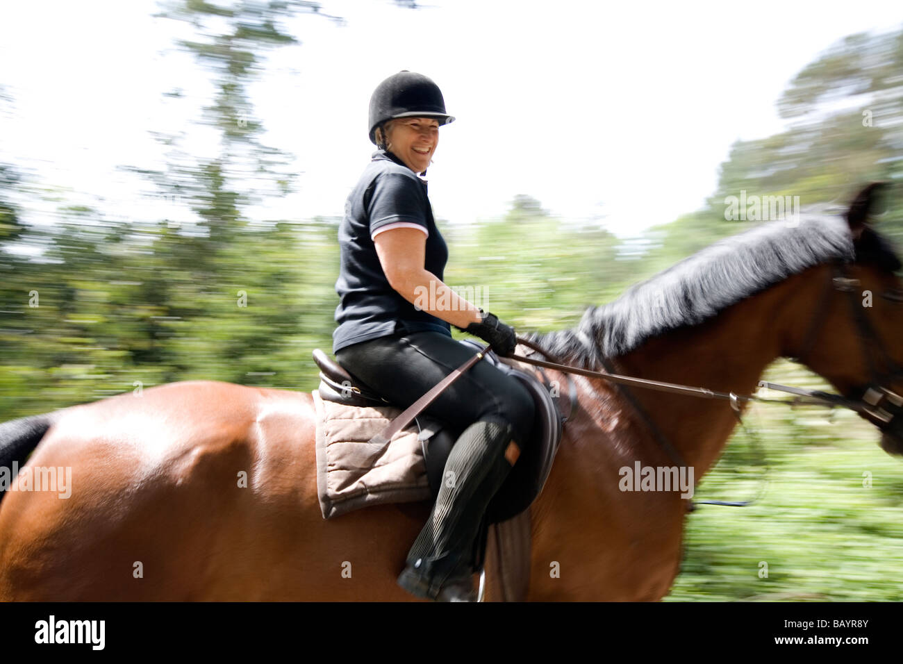 Action girl riding horse hi-res stock photography and images - Alamy