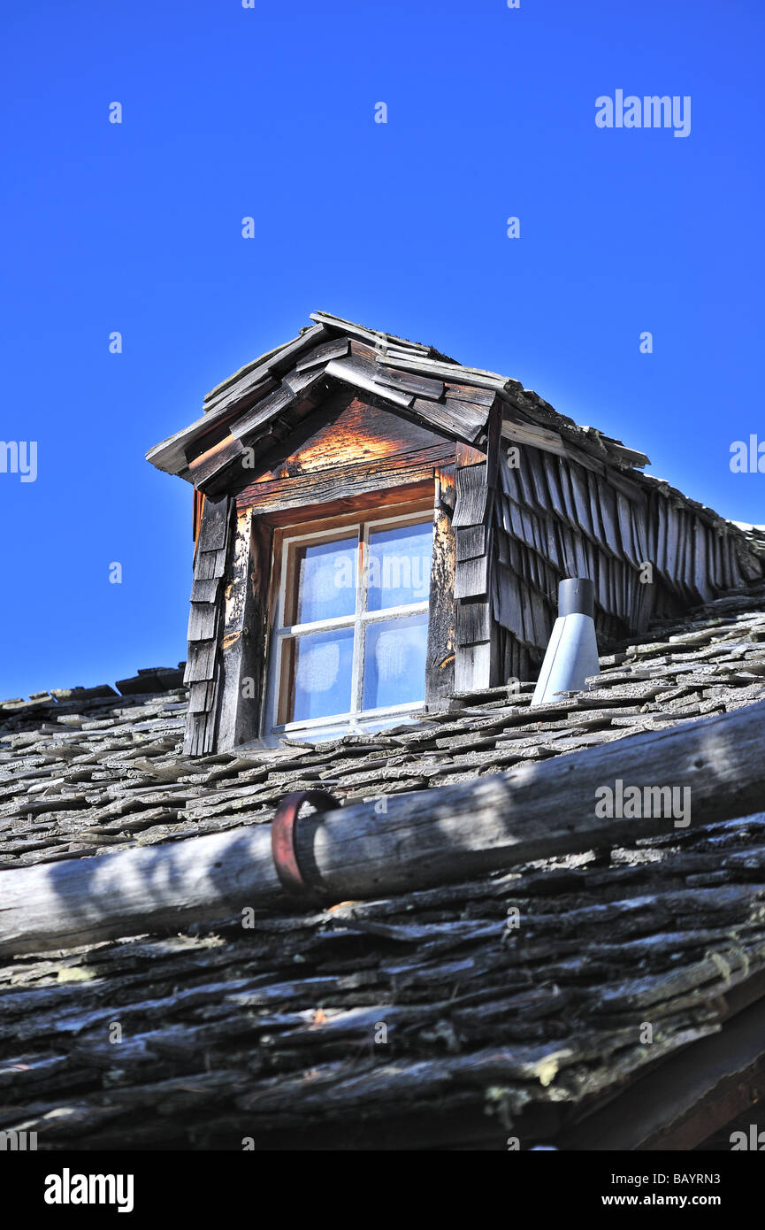 Dormer window in traditionally-built roof of a Swiss house Stock Photo ...