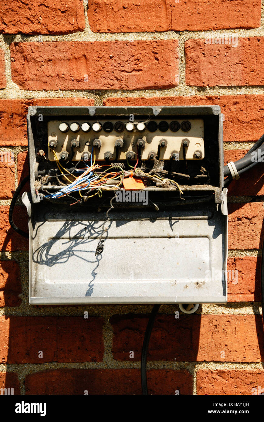 Telephone connection on side of apartment building Stock Photo - Alamy