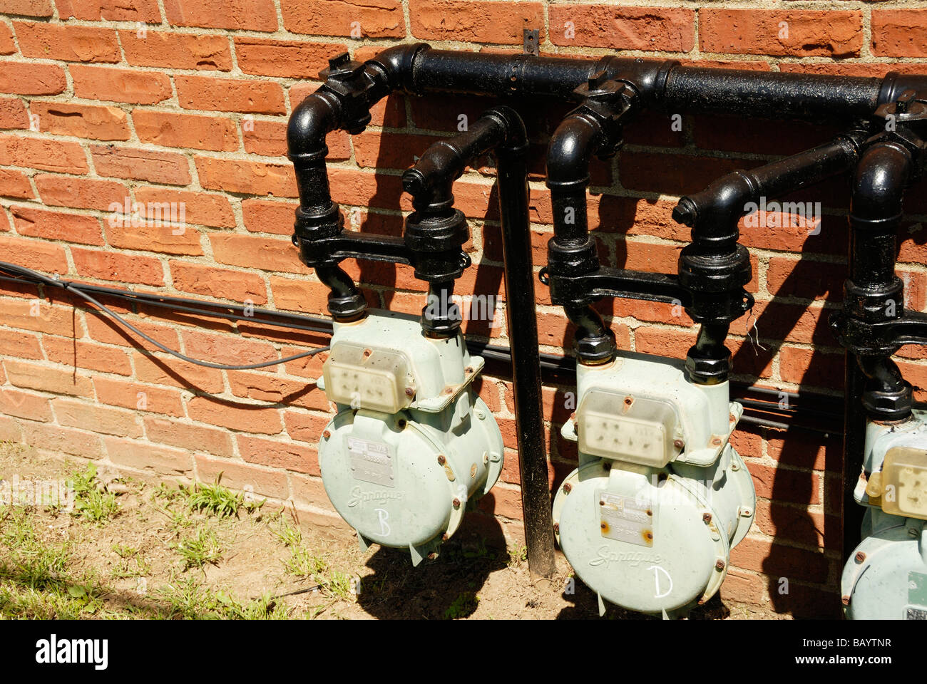 Gas meter on side of building Stock Photo - Alamy