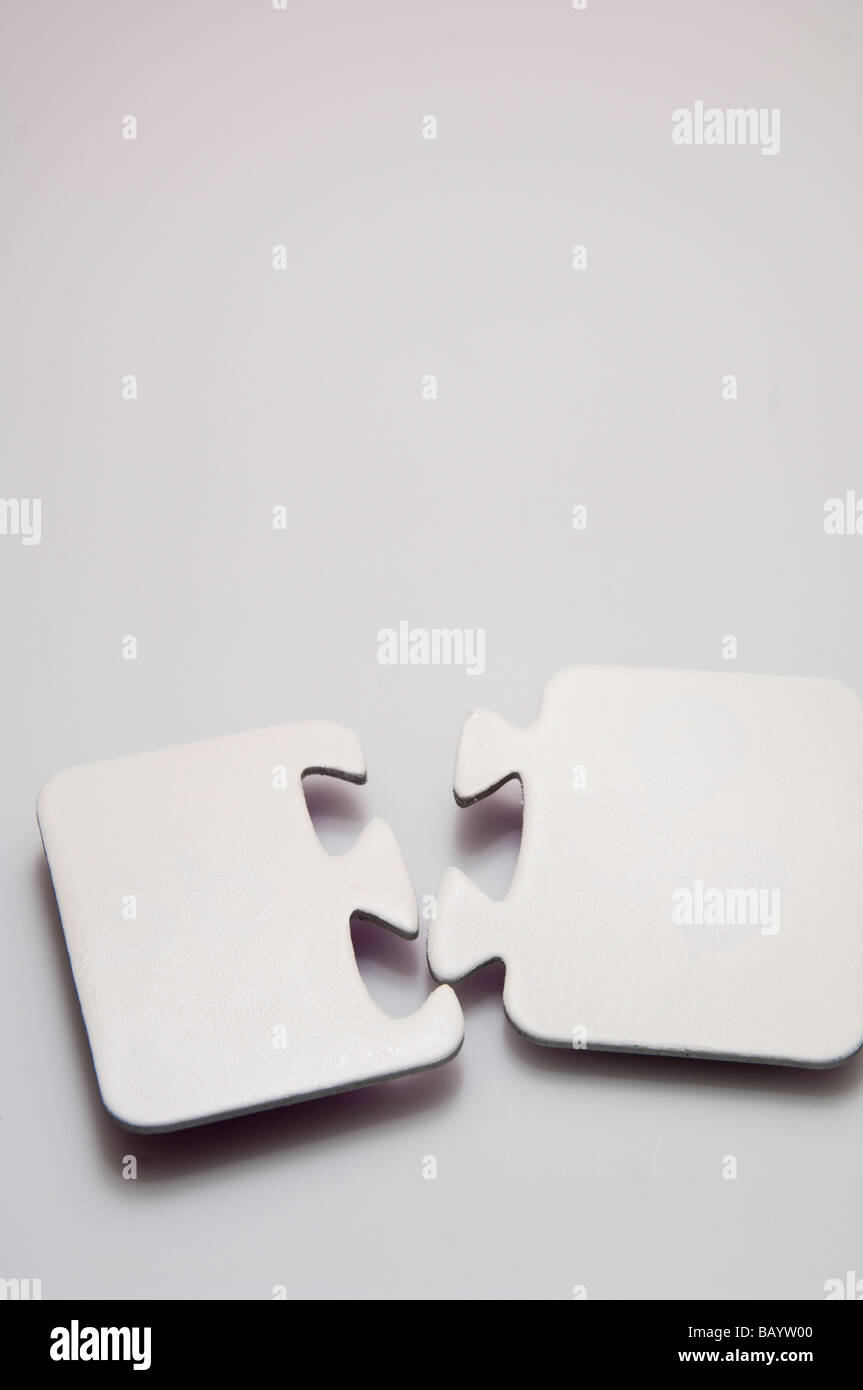 White jigsaw puzzle pieces Stock Photo - Alamy