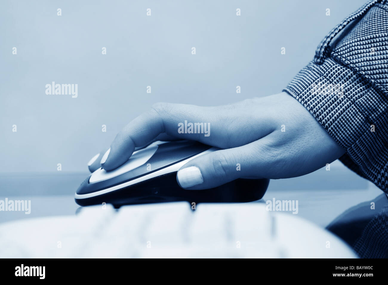 Female hand holding the wireless computer mouse Stock Photo - Alamy