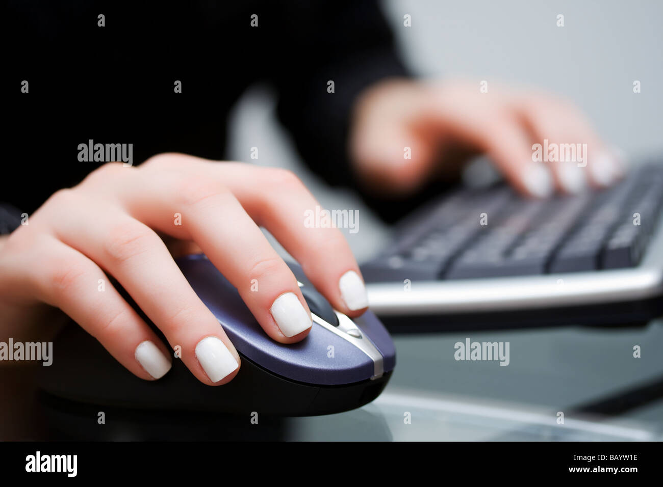 Female hand working on the computer Stock Photo - Alamy