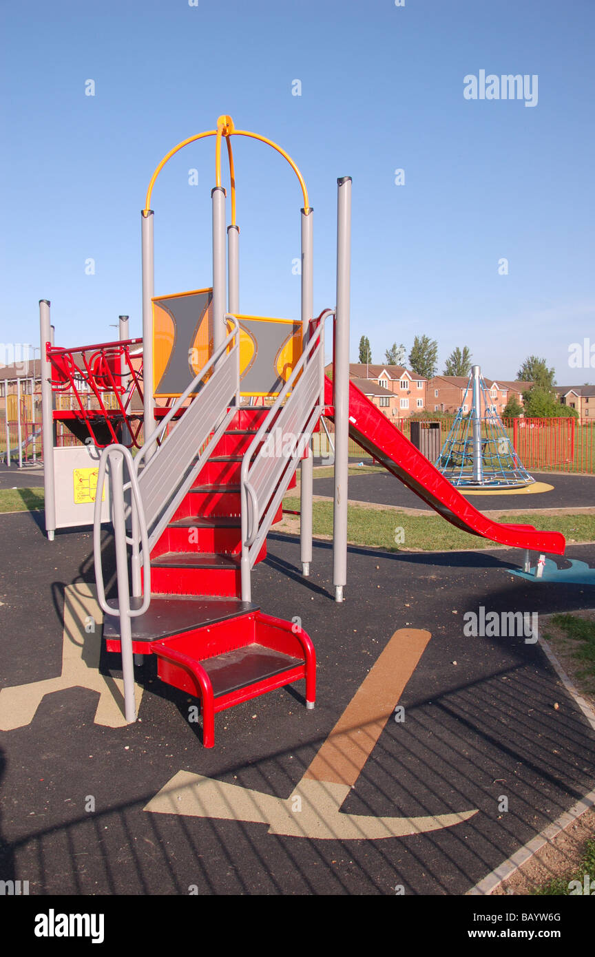 Climbing frames and slides at the Children's play ground in Grove Park ...