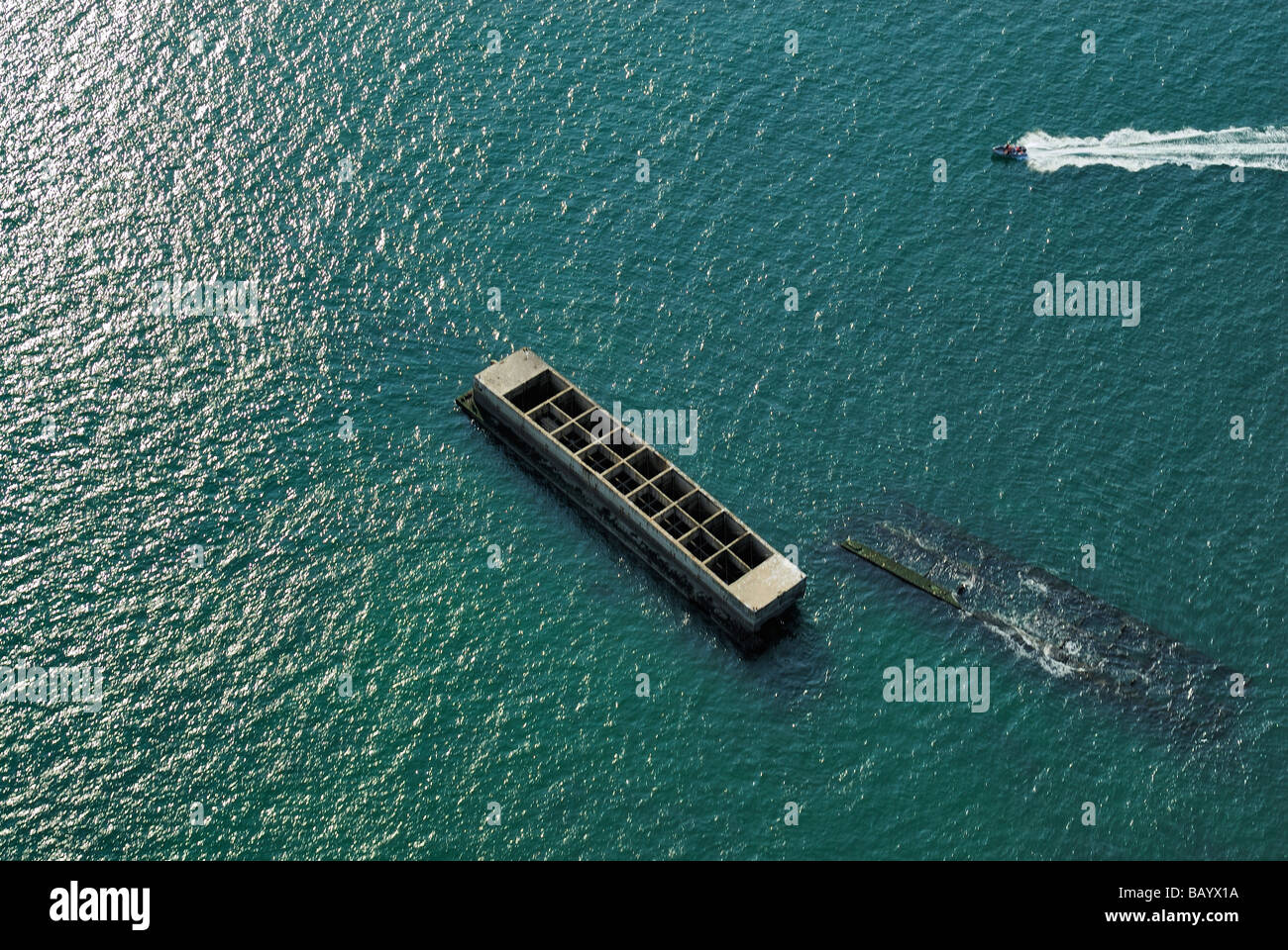 Remains of the artificial harbour Mulberry B in Arromanches Stock Photo ...