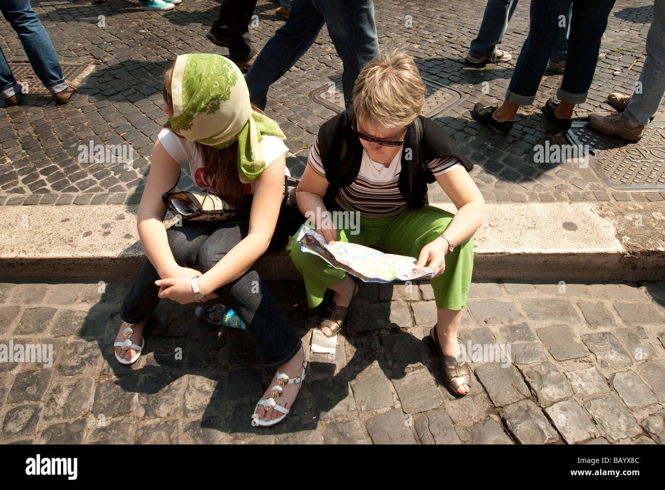 two tourists map reading in rome Stock Photo - Alamy