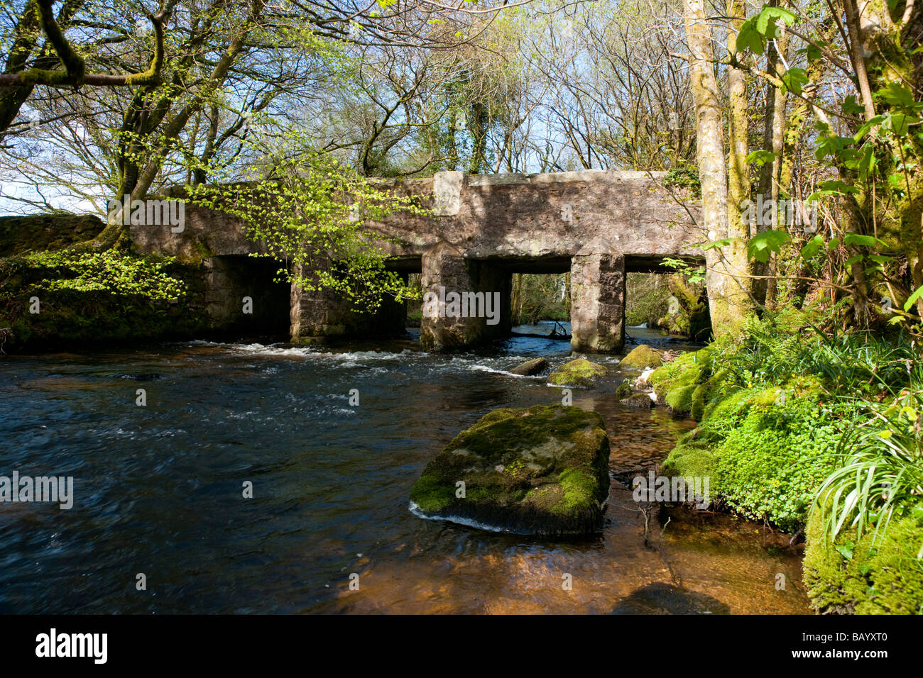 Stone built road bridge over the river Fowey in sunlight Stock Photo ...