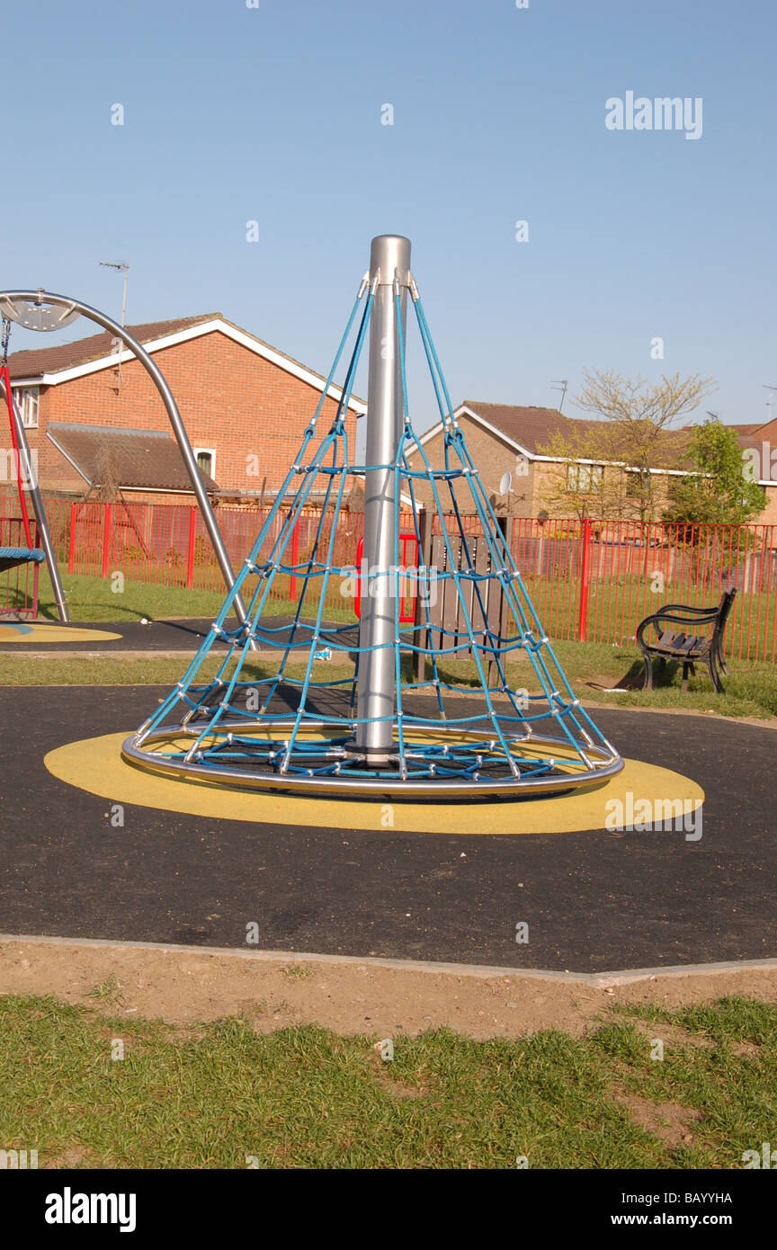 Play ground children merry go round hi-res stock photography and images ...