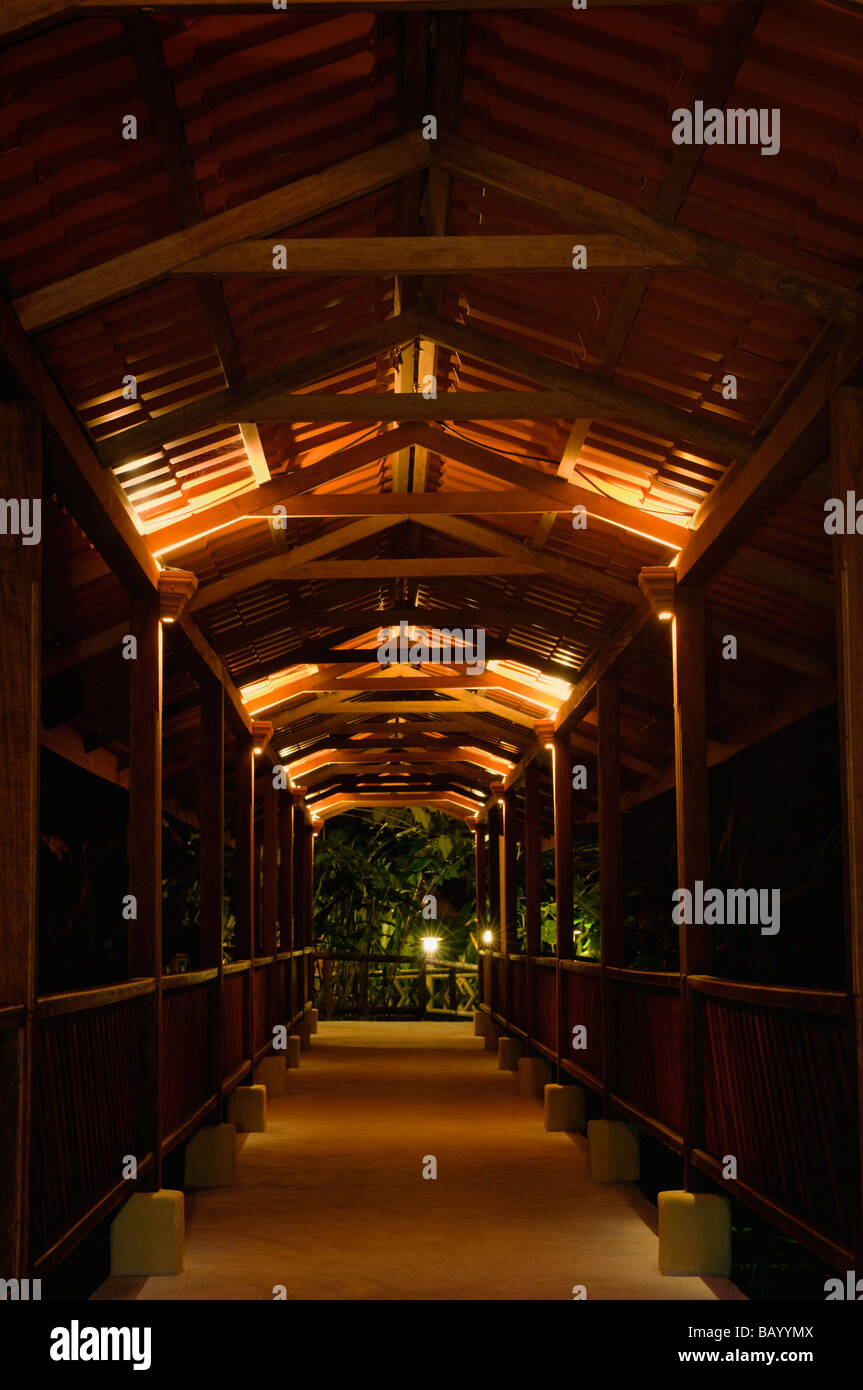 Covered walkway in rainforest resort hi-res stock photography and ...