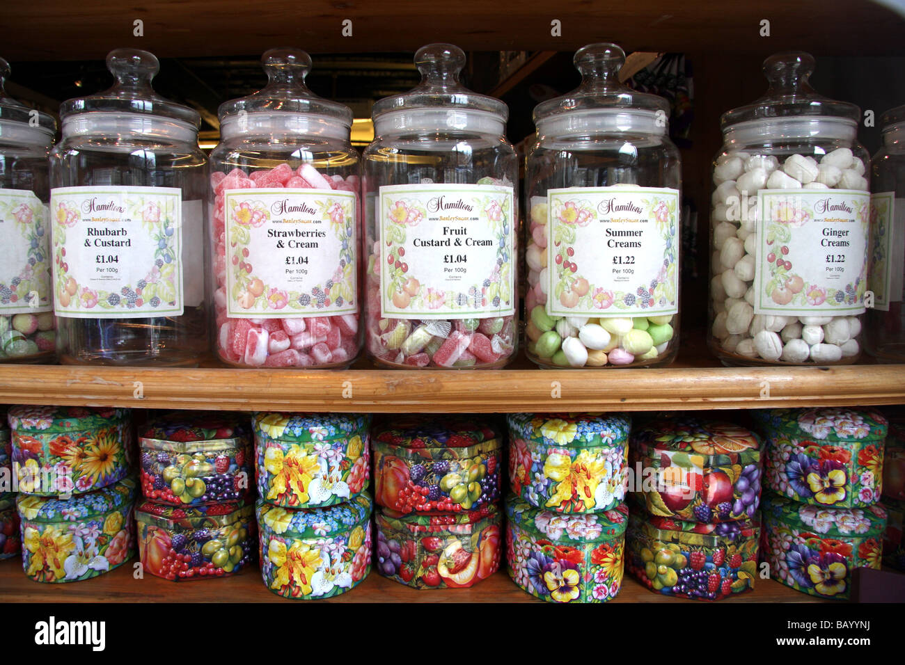 Sweet jars and tins in Sweet shop window Stock Photo - Alamy