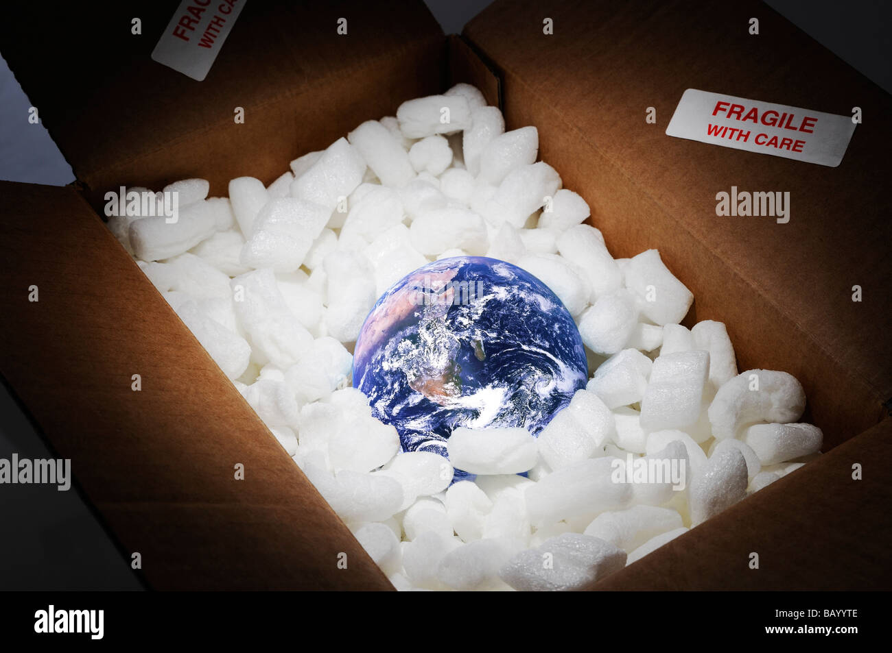 Planet Earth in Open Cardboard Box Surrounded by Protective Packing and ...