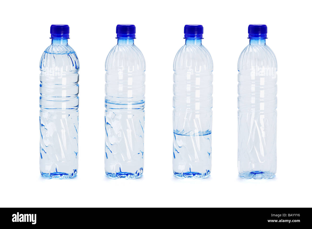 Different water levels in plastic bottles on white background Stock ...