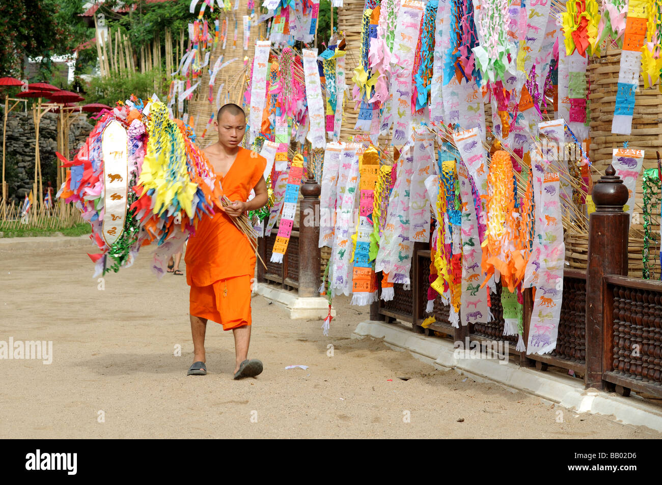 monks with songkran decorations at wat phan tao chiangmai thailand ...