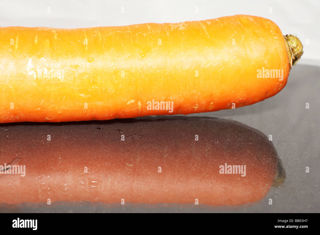 Long orange carrot hi-res stock photography and images - Alamy