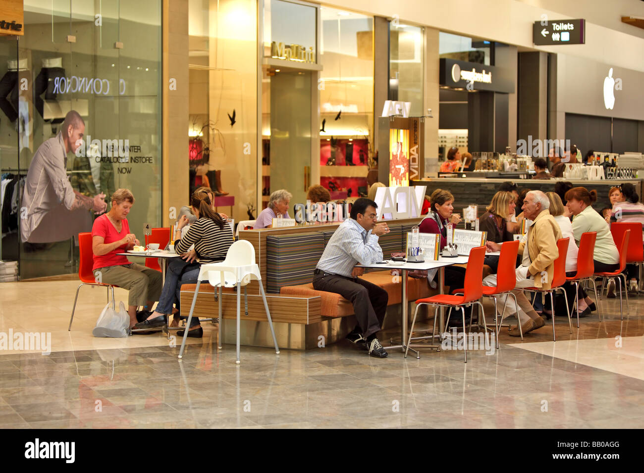 Crowds of shoppers in a modern shopping centre Stock Photo - Alamy