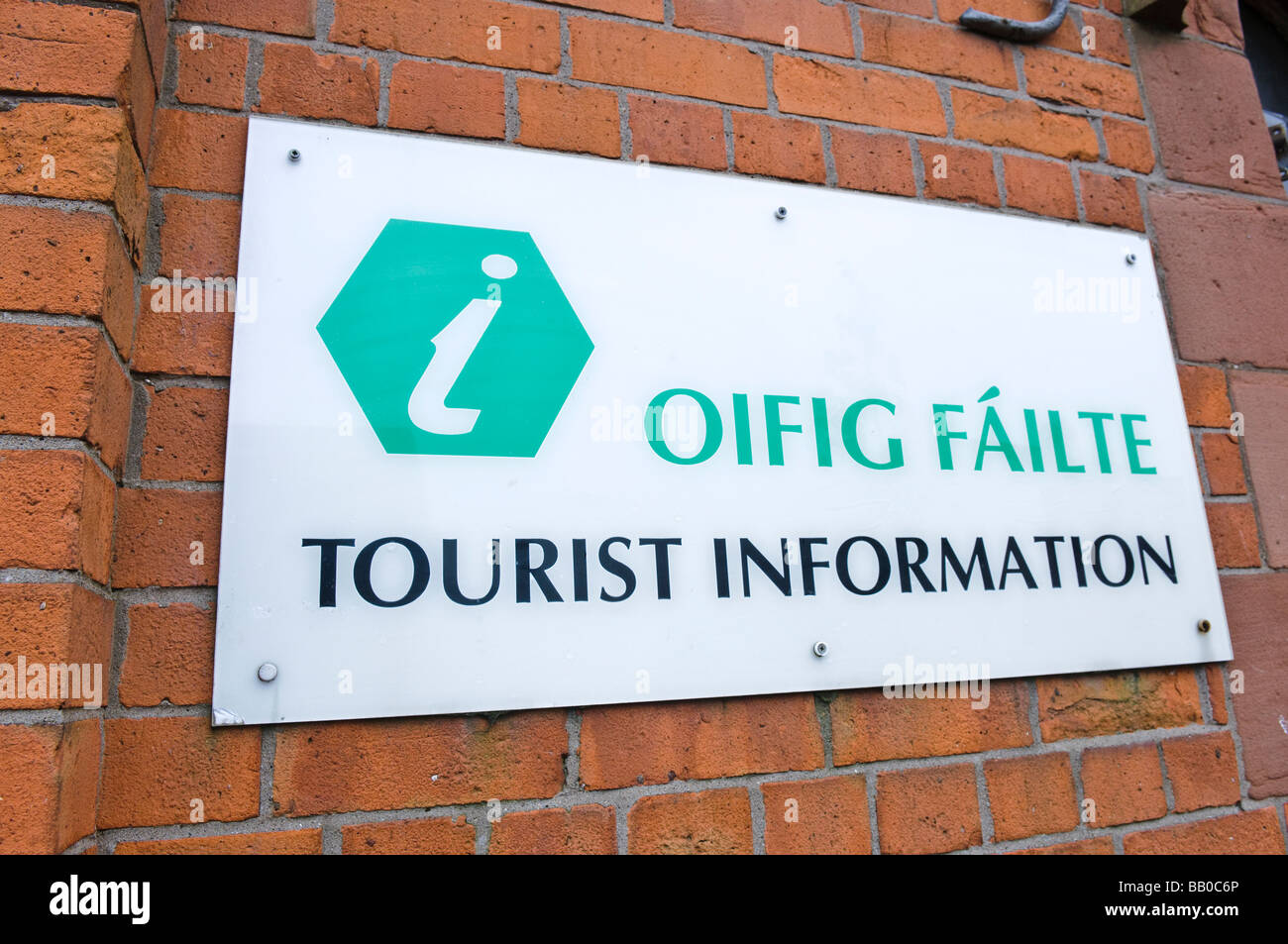 Tourist Information sign in English and Irish/Gaelic Stock Photo - Alamy