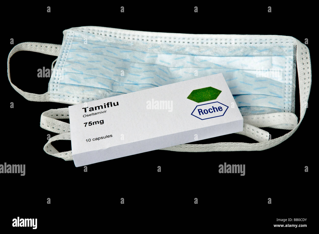 Box of Tamiflu (TM Roche) sitting on a surgical mask Stock Photo - Alamy