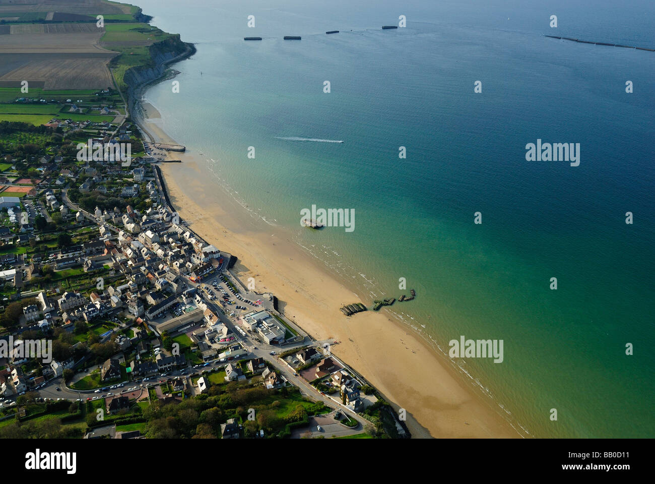 Remains of the artificial harbour Mulberry B in Arromanches Stock Photo ...